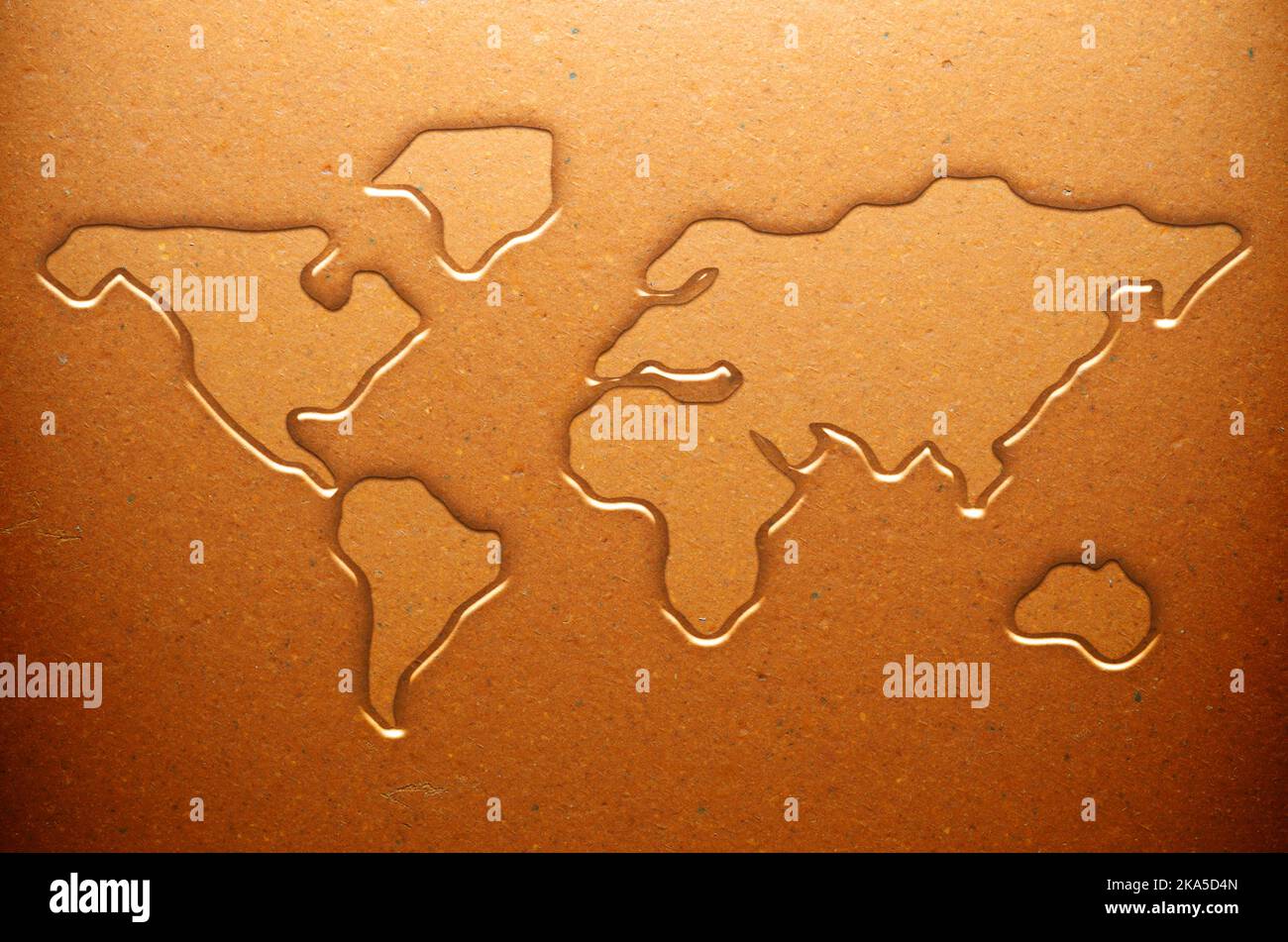 Rising sea level from climate change, illustrated by puddle of water ...