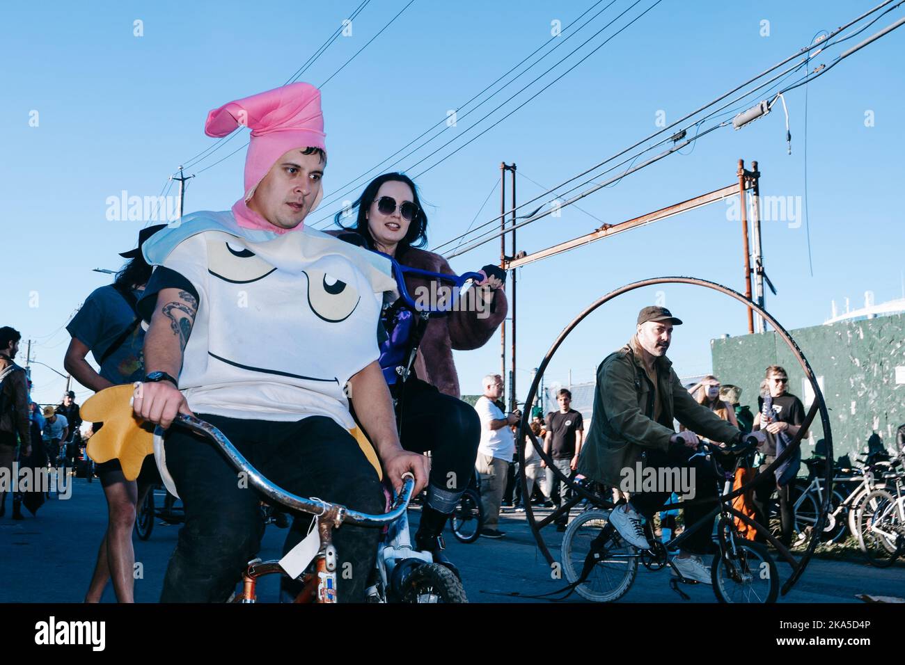New York, USA. 29th Oct, 2022. Costumed man rides a modified bicycle ...