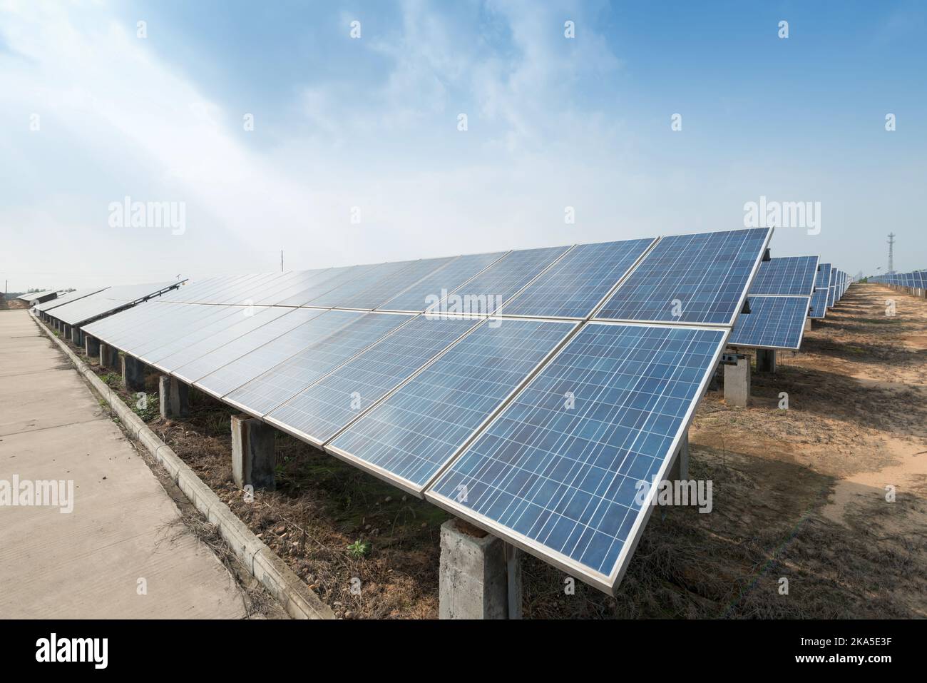 Solar panels against blue sky Stock Photo - Alamy
