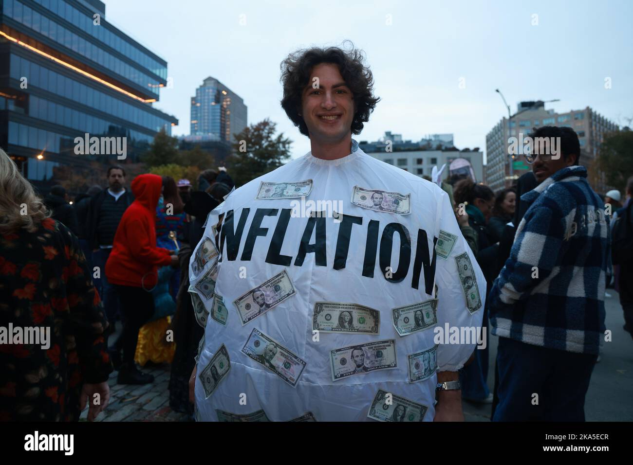 New York, New York/ USA – 31 Oct 2022:A reveler dressed up as inflation ...