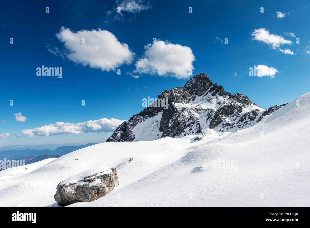 Snow capped mountains Stock Photo - Alamy