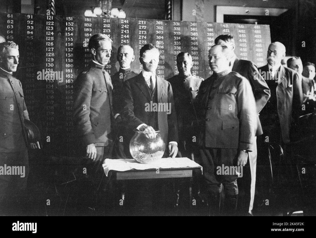 Secretary of War Newton Baker draws the first draft number on 20 July ...