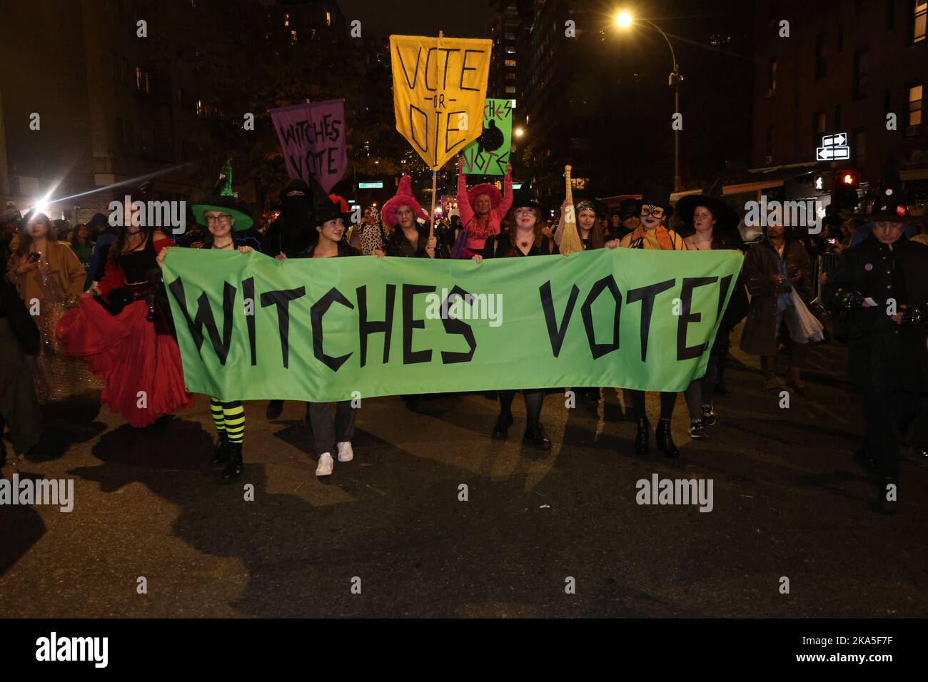 New York, New York/ USA – 31 Oct 2022:A group of witches carry a banner ...