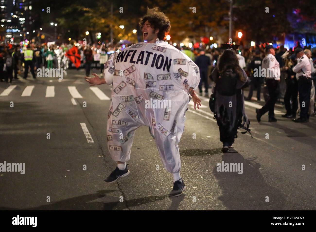 New York, New York, USA. 31st Oct, 2022. Inflation costume revelers of ...