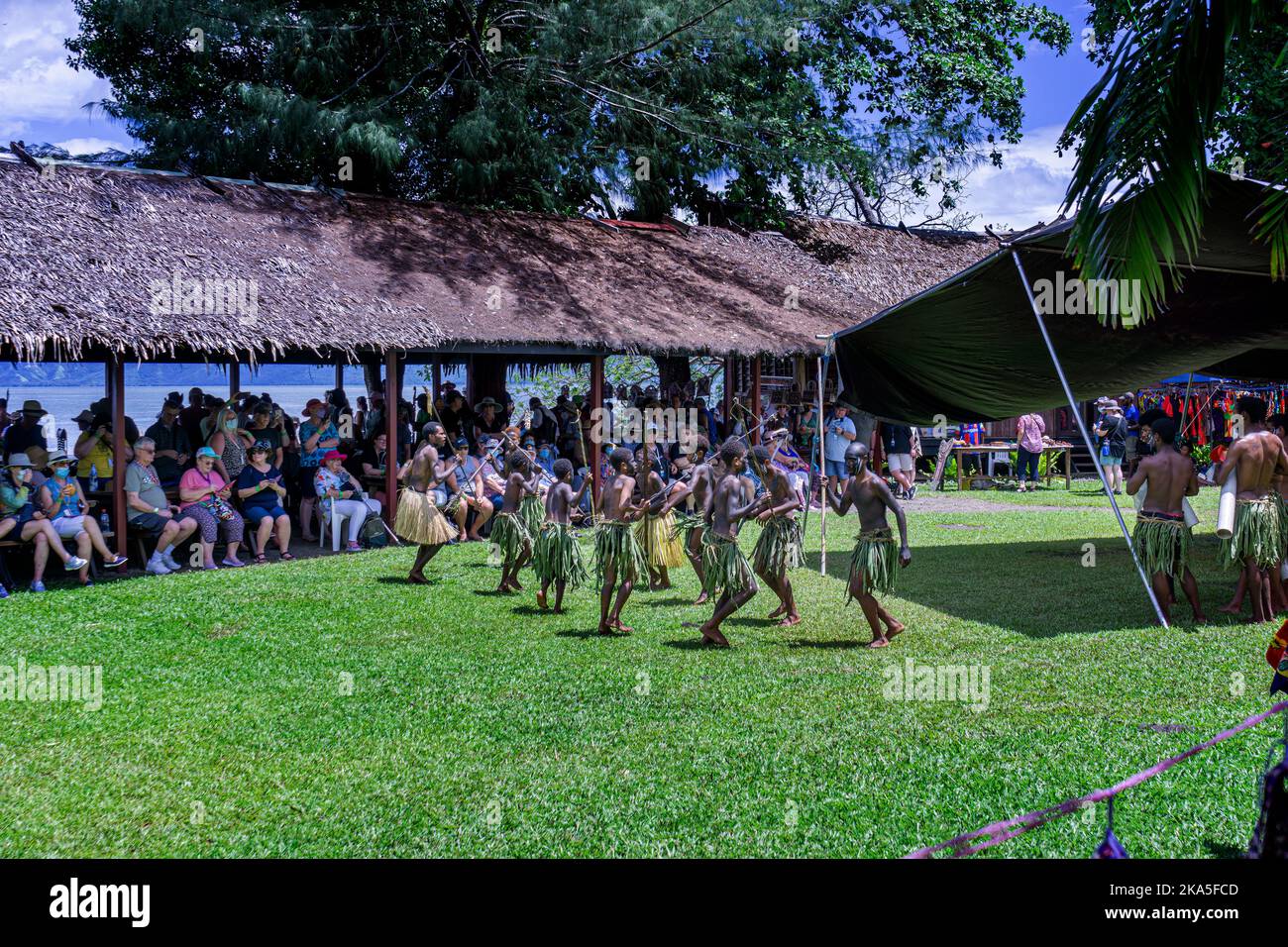 Indigenous dancers in traditional costume performing for tourist at ...