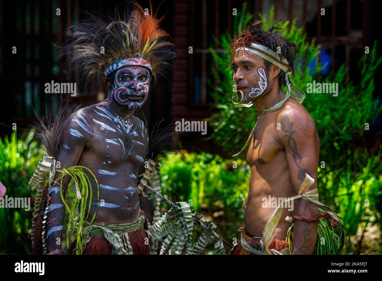 Indigenous warriers in traditional costume putting on display for ...