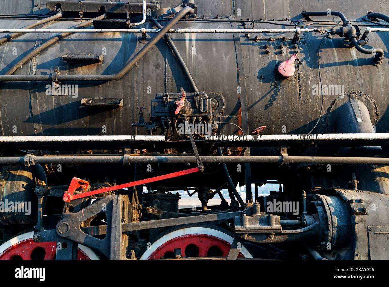 Old steam engine train and parts close-up Stock Photo - Alamy