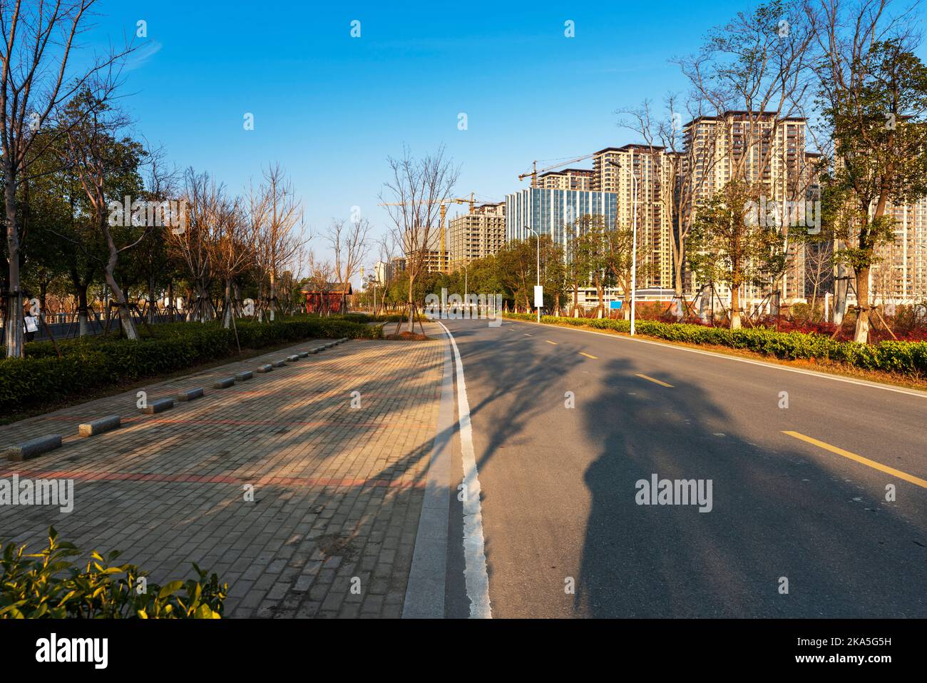 Empty urban road and buildings in China Stock Photo - Alamy