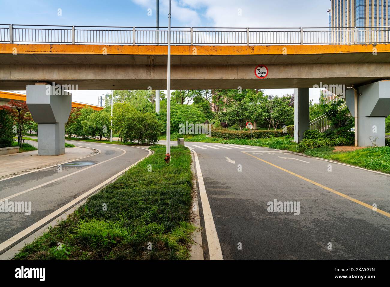 Concrete structure and asphalt road space under the overpass in the ...