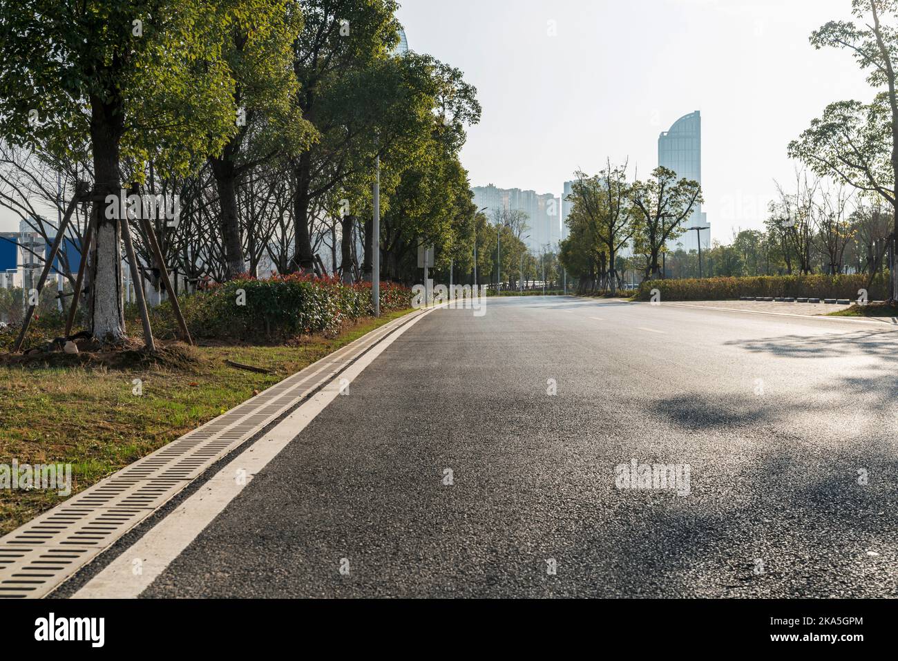 Empty urban road and buildings in China Stock Photo - Alamy