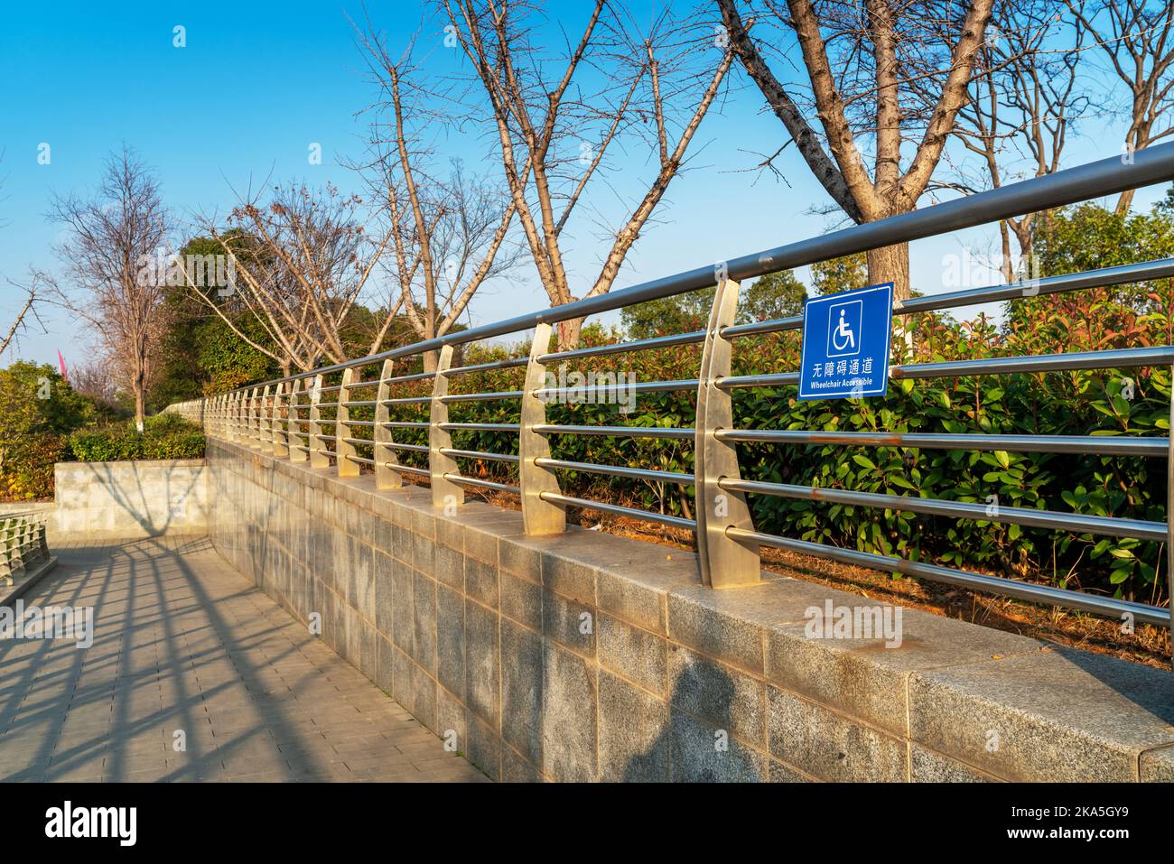 A wheelchair ramp, an inclined plane installed in addition to or ...