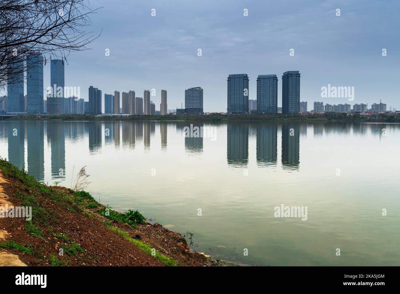 Lakeside modern office building in China Stock Photo - Alamy