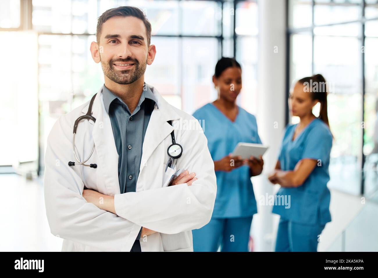 Doctor, leadership or healthcare employee with smile in hospital for ...