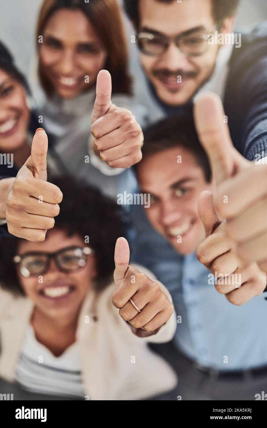 Success is all in your hands. Portrait of a group of businesspeople ...