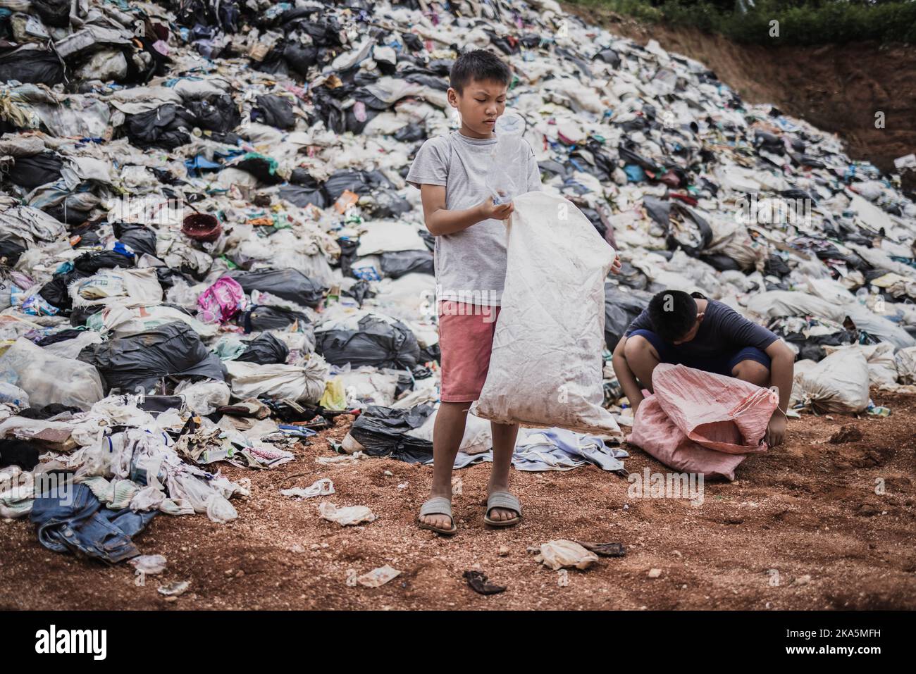 Poor children collect garbage for sale because of poverty, Junk recycle ...