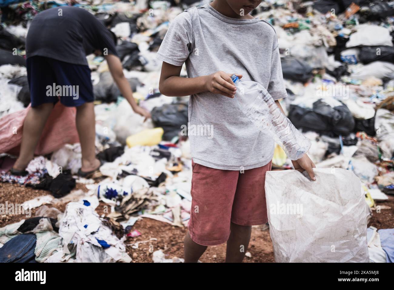 Poor children collect garbage for sale because of poverty, Junk recycle ...