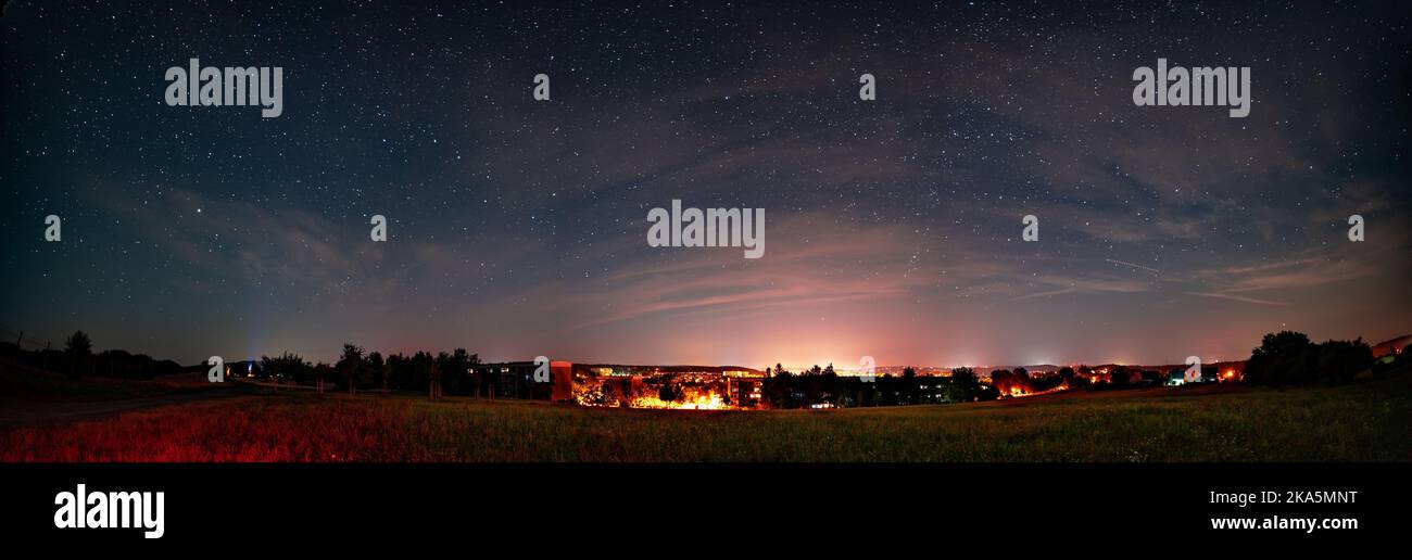 night city panorama with starry sky Stock Photo - Alamy