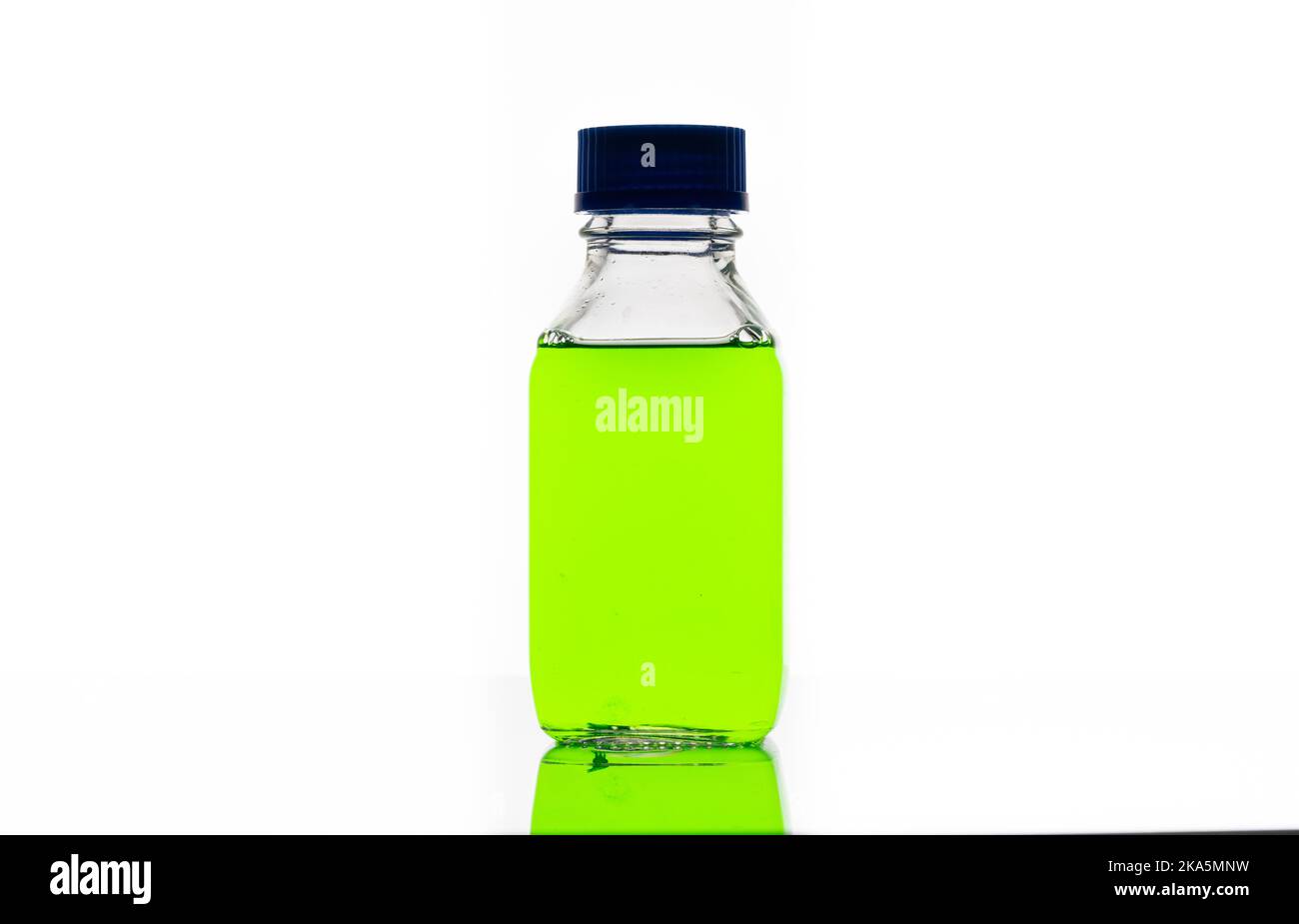green chemical solution in a reagent bottle Stock Photo - Alamy