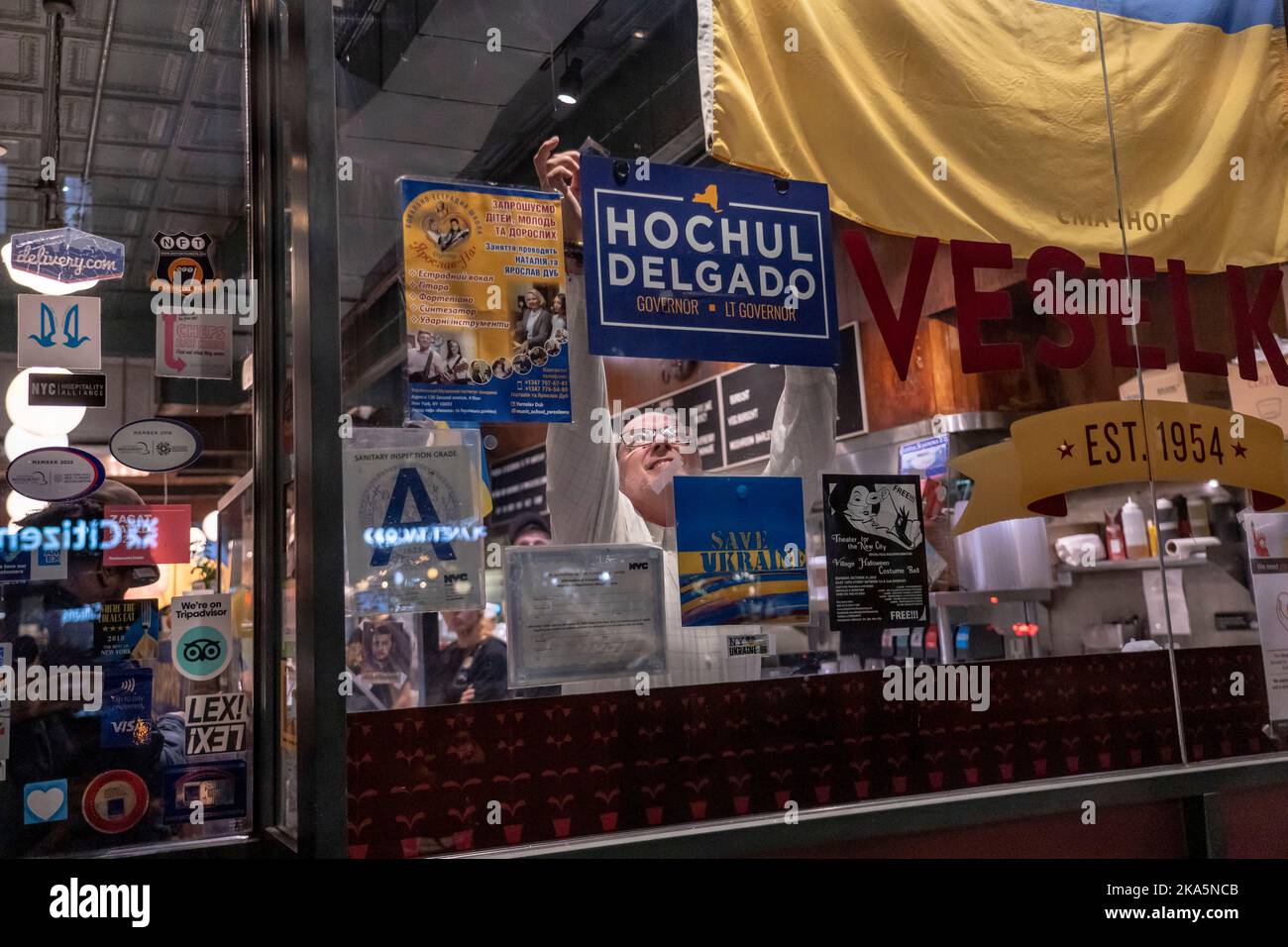 New York, United States. 31st Oct, 2022. An employee post election sign ...