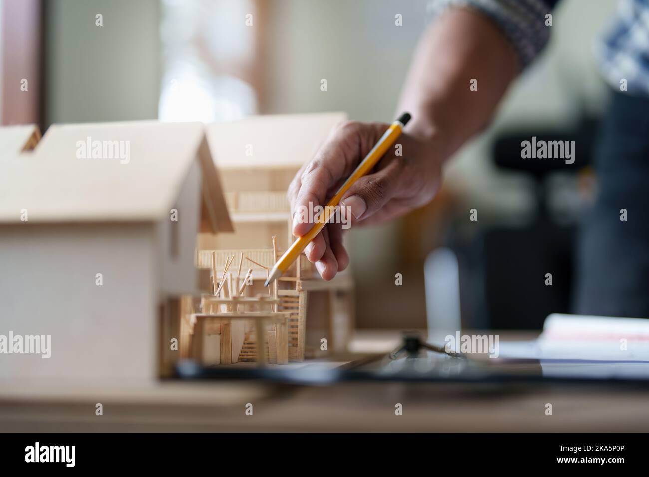 Architect man working with blueprints for architectural plan, engineer ...