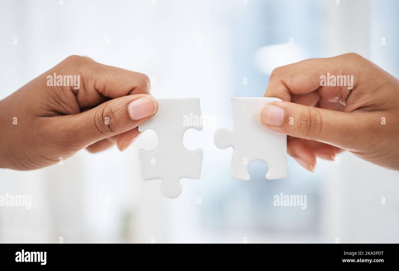 Closeup hands puzzle, problem solving teamwork in information ... Closeup hands puzzle, problem solving teamwork in information ...