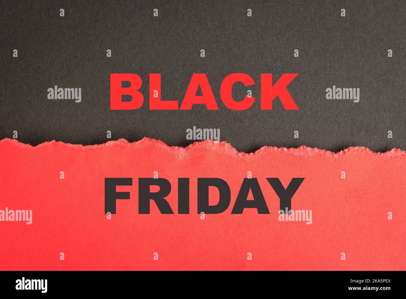 Black Friday, text on black and red paper. For advertisement Stock ...