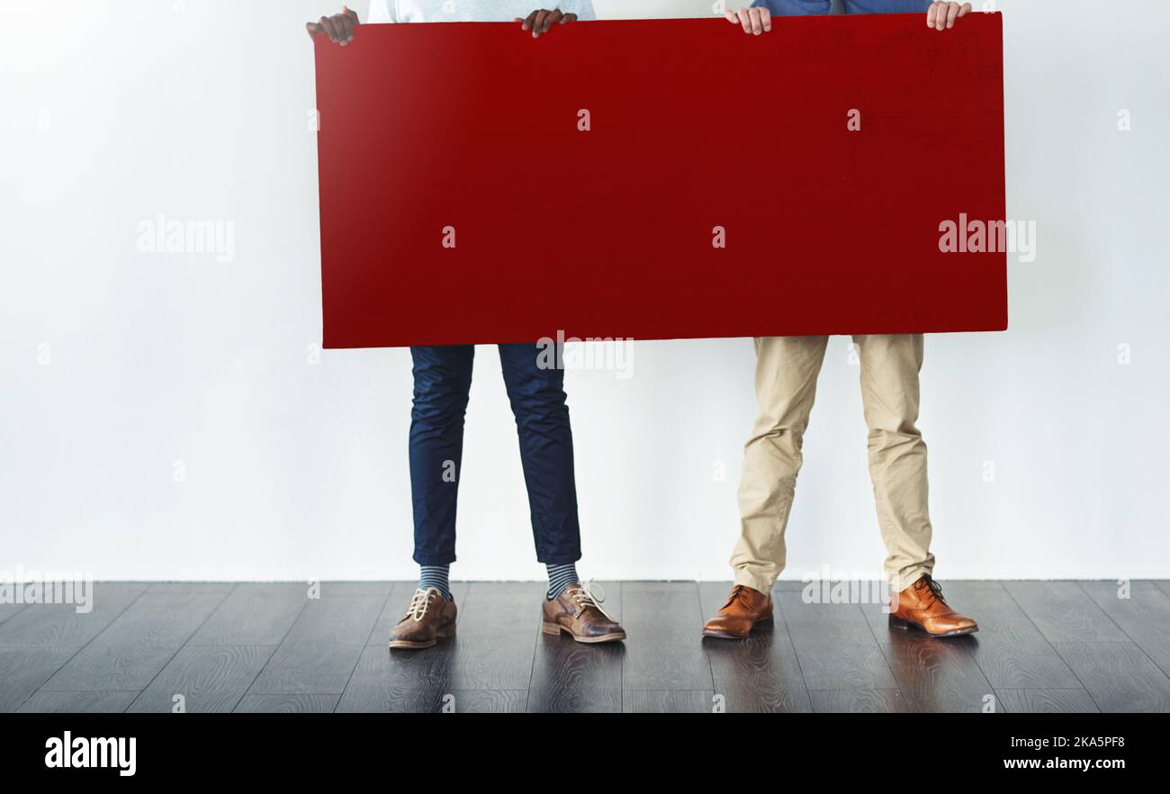 For your urgent attention. Cropped studio shot of two businessmen ...