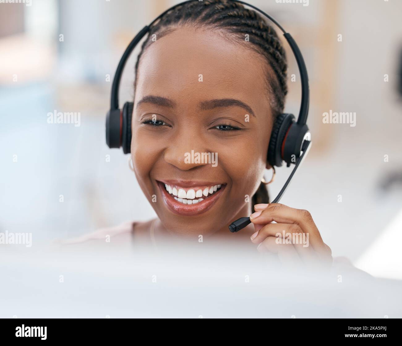 Call centre woman smiling hi-res stock photography and images - Alamy