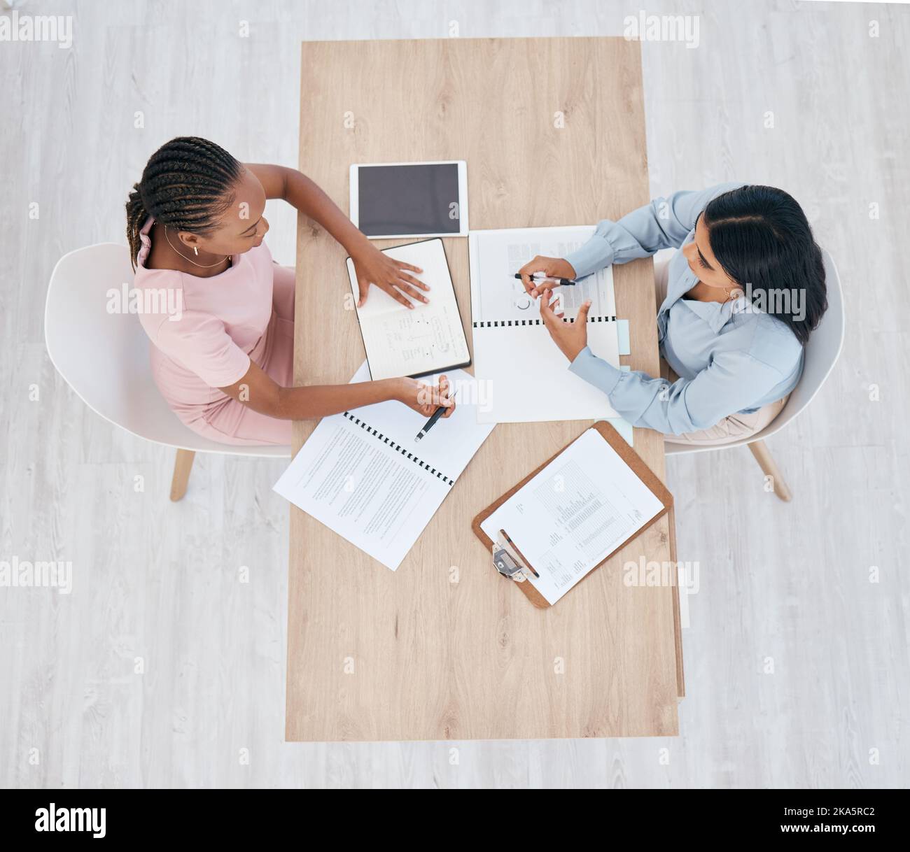 Young women working documents hi-res stock photography and images - Alamy