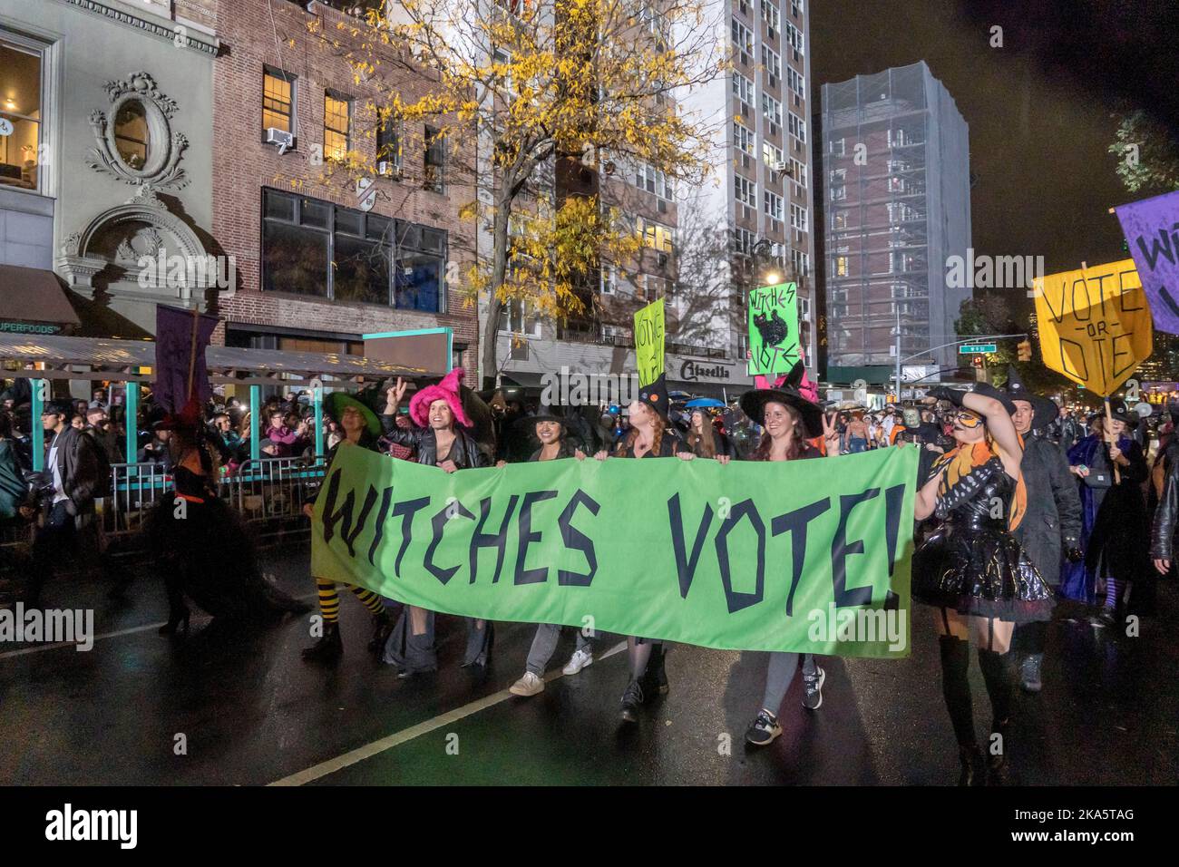 NEW YORK, NY - OCTOBER 31: Revelers dressed in witches costume march ...