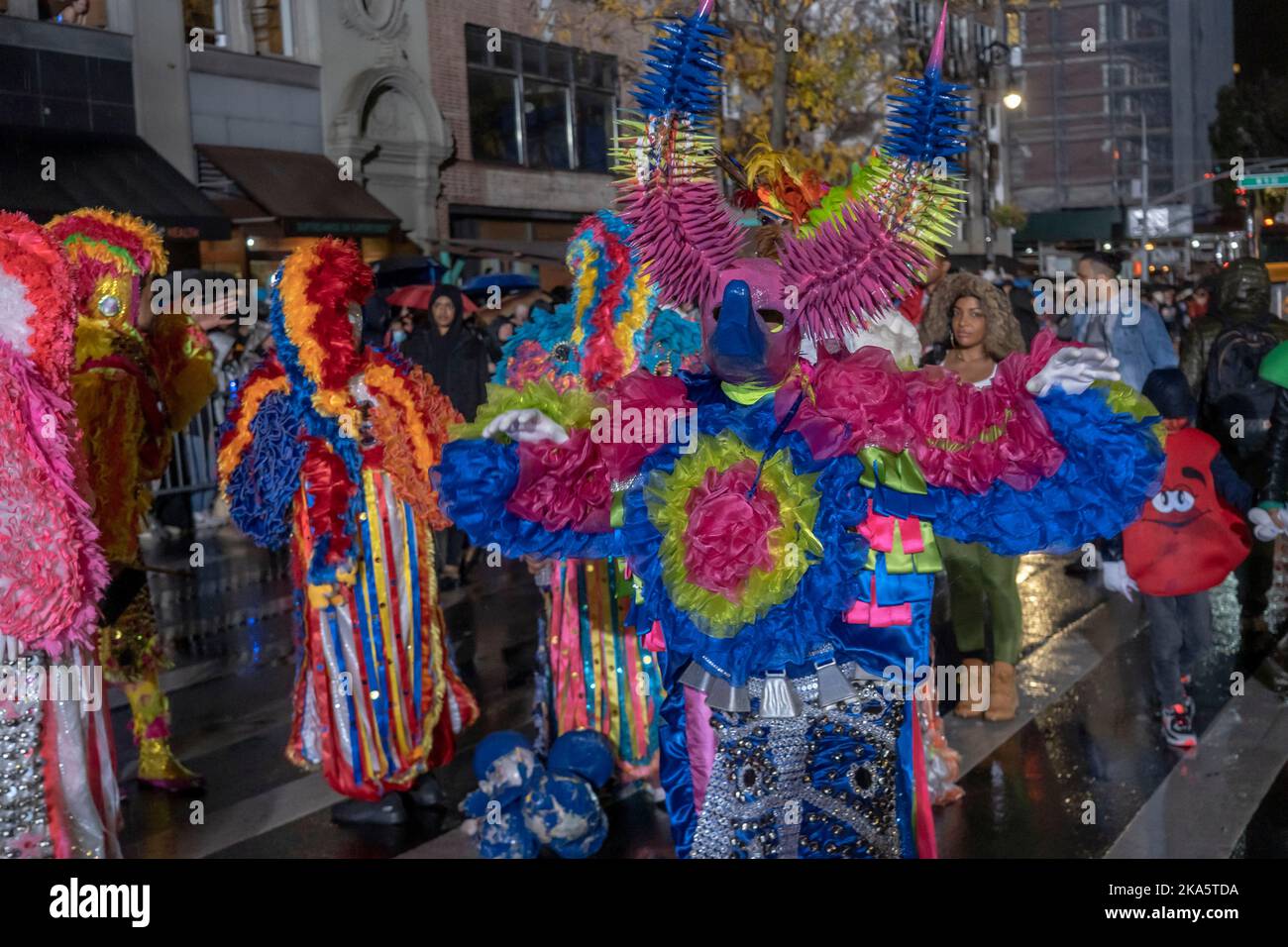 NEW YORK, NY - OCTOBER 31: Revelers dressed in costume participate in ...