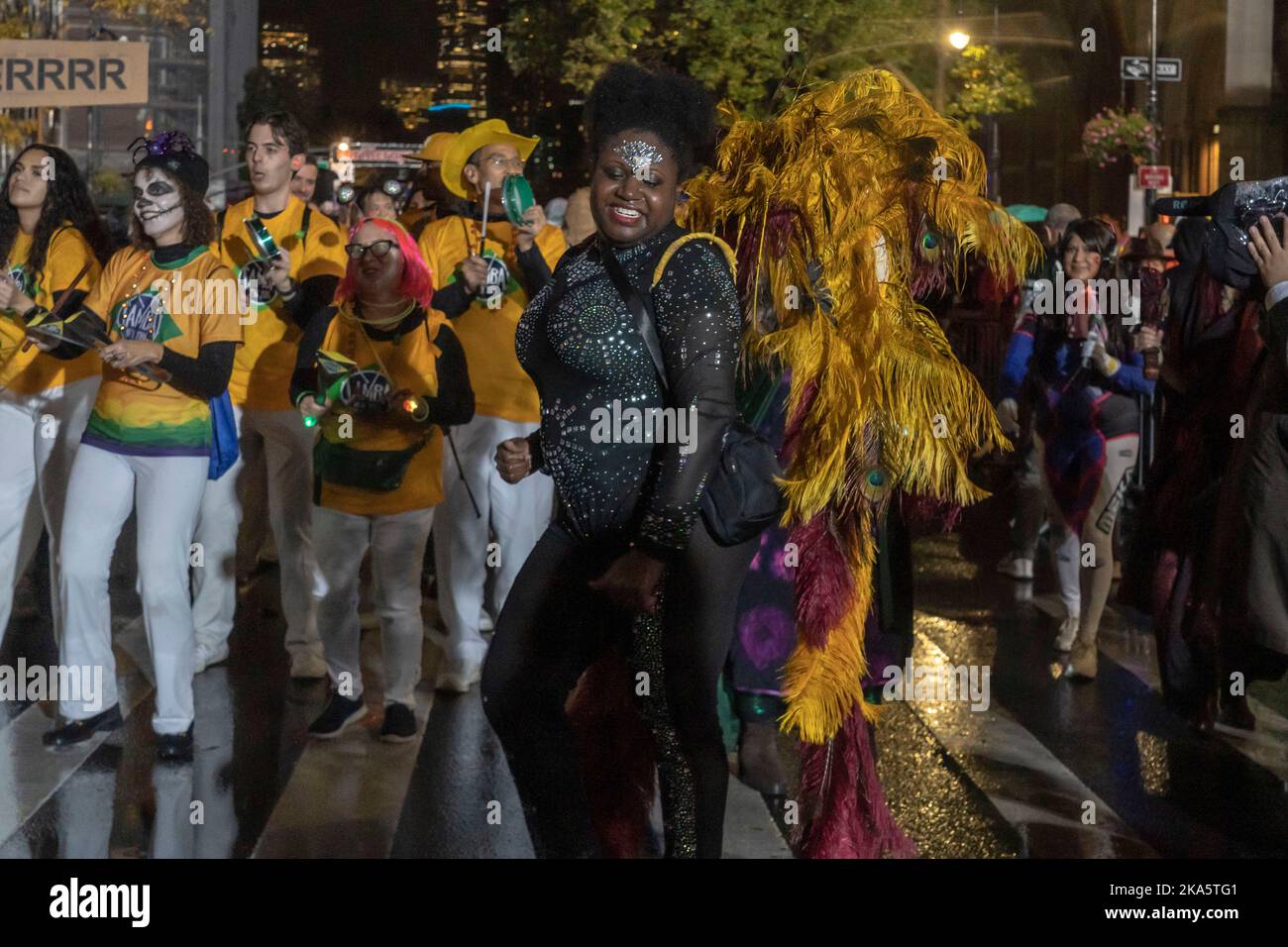NEW YORK, NY - OCTOBER 31: Members of a Samba group participate in the ...
