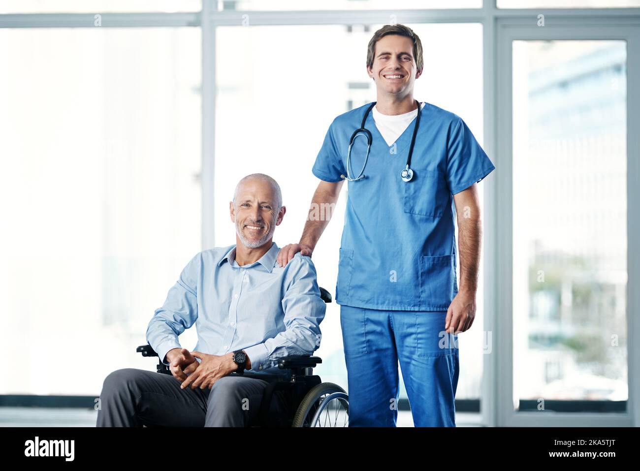 All patients are well looked after here. Portrait of a male nurse ...