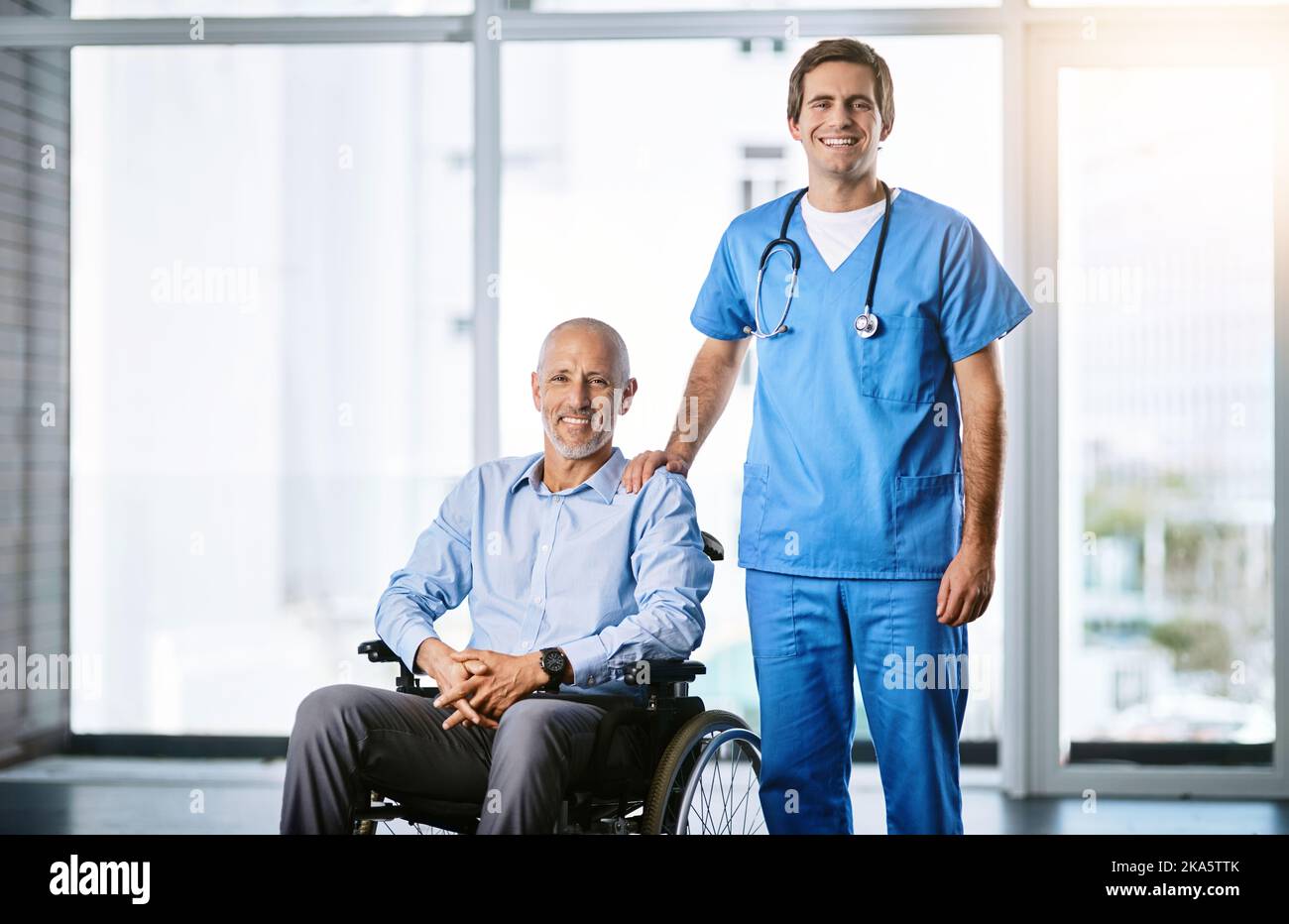 The kind of care I can depend on. Portrait of a male nurse caring for a ...