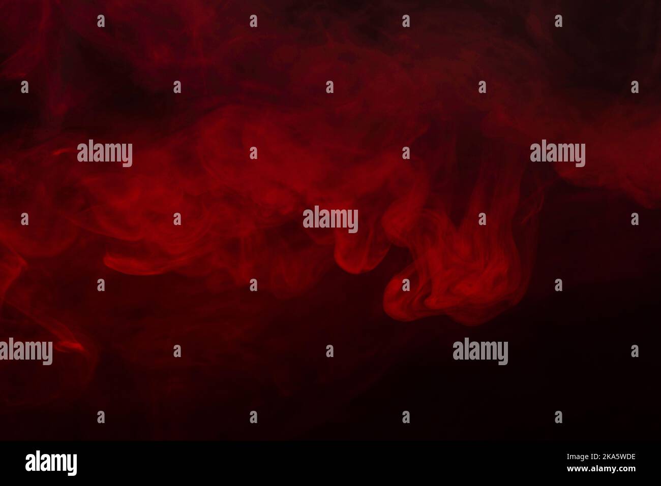 Red steam on a black background. Copy space Stock Photo - Alamy