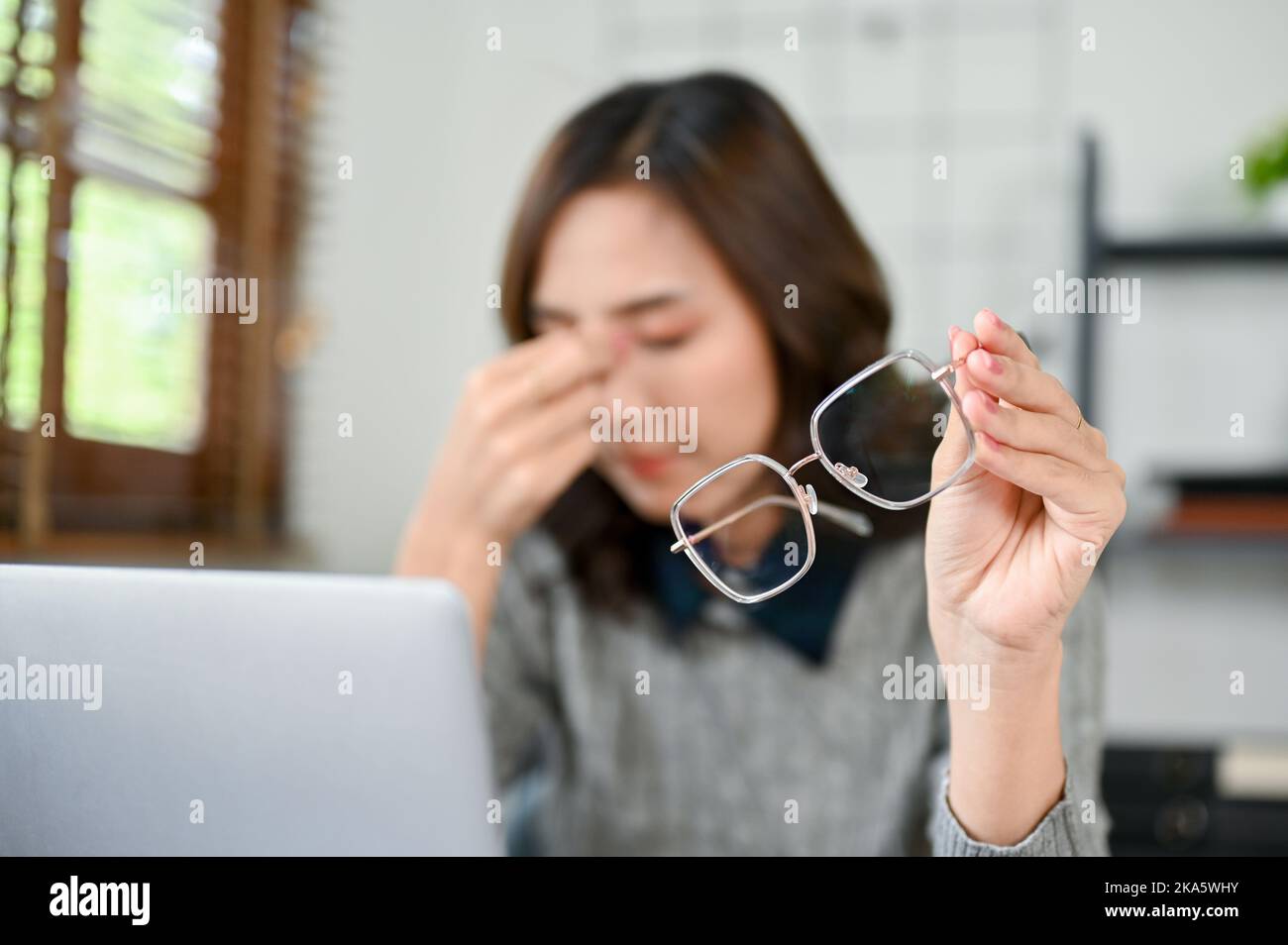 Taking off eyeglasses hi-res stock photography and images - Alamy