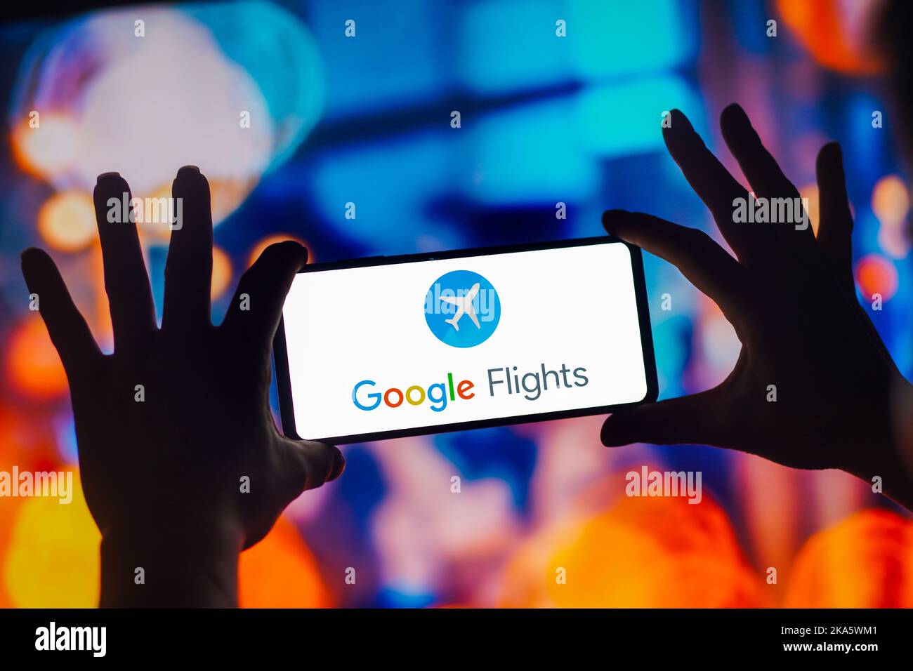 In this photo illustration, the Google Flights logo is displayed on a ...