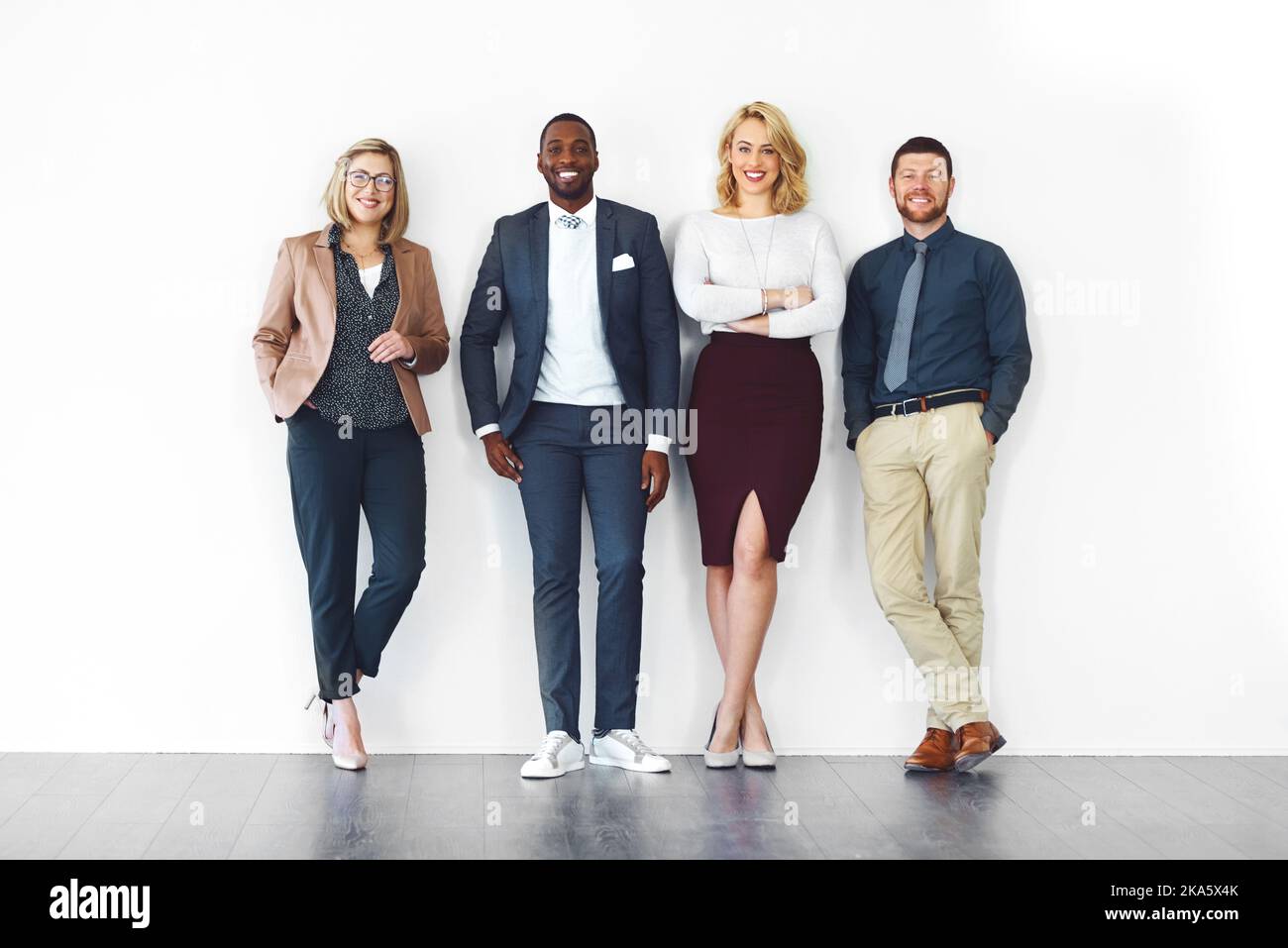 We are the leaders of today. well-dressed businesspeople standing ...