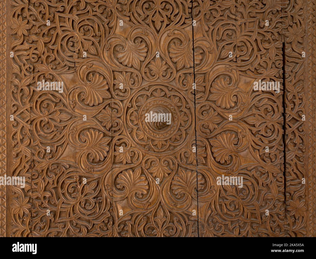 Closeup view of intricate traditional islamic wood carving of floral ...