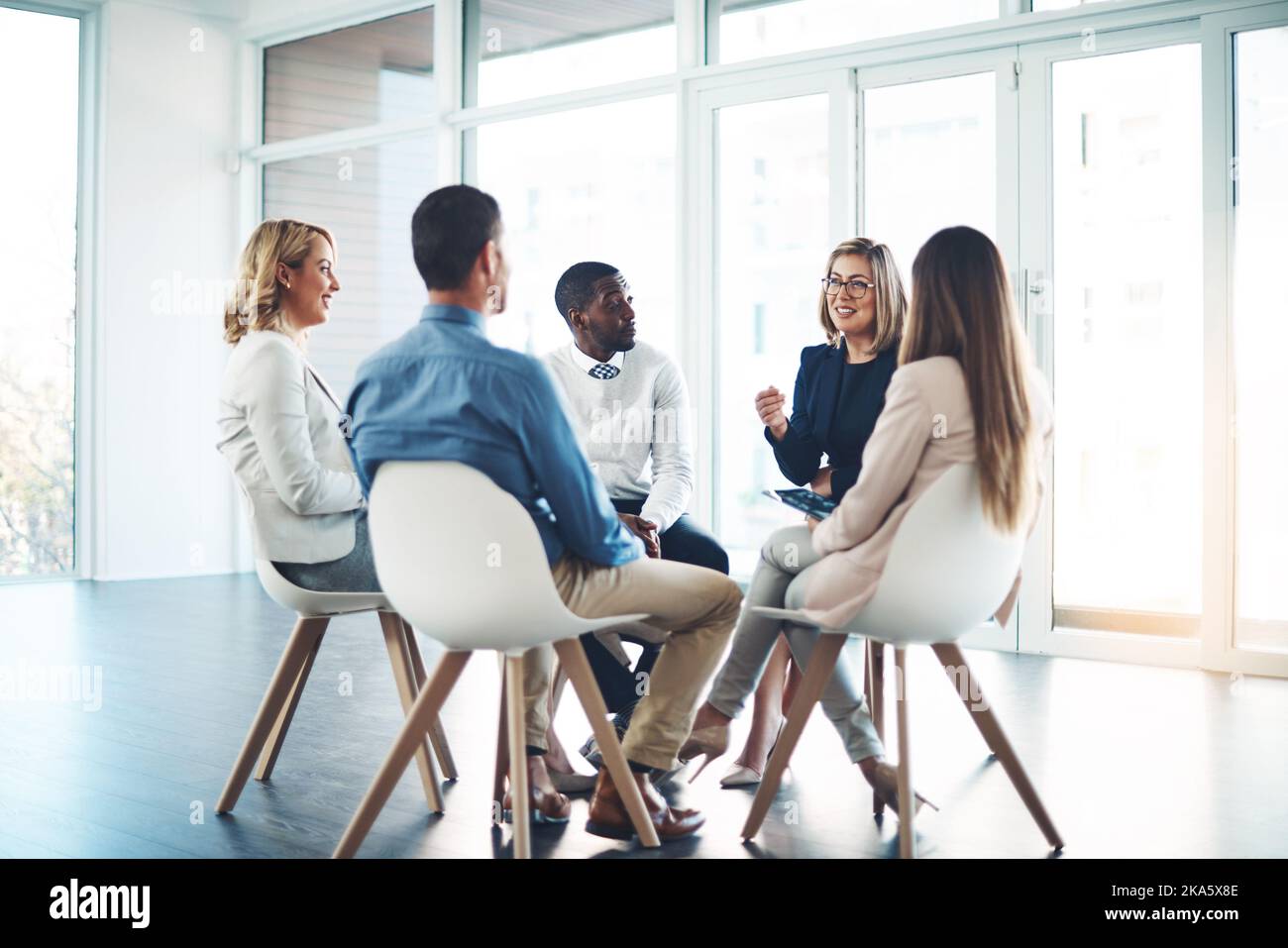I have an idea. Full length shot of a group of corporate colleagues ...