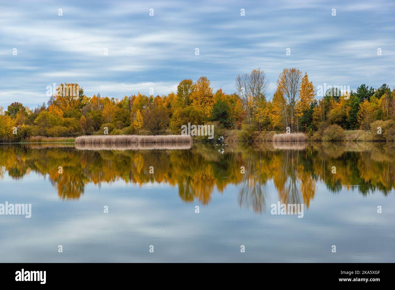 Lake between fields and forests. Late fall. Europe Stock Photo - Alamy