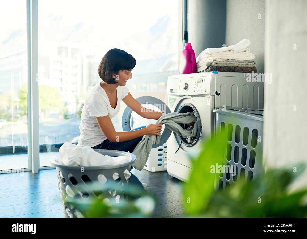 Doing laundry alone hi-res stock photography and images - Alamy
