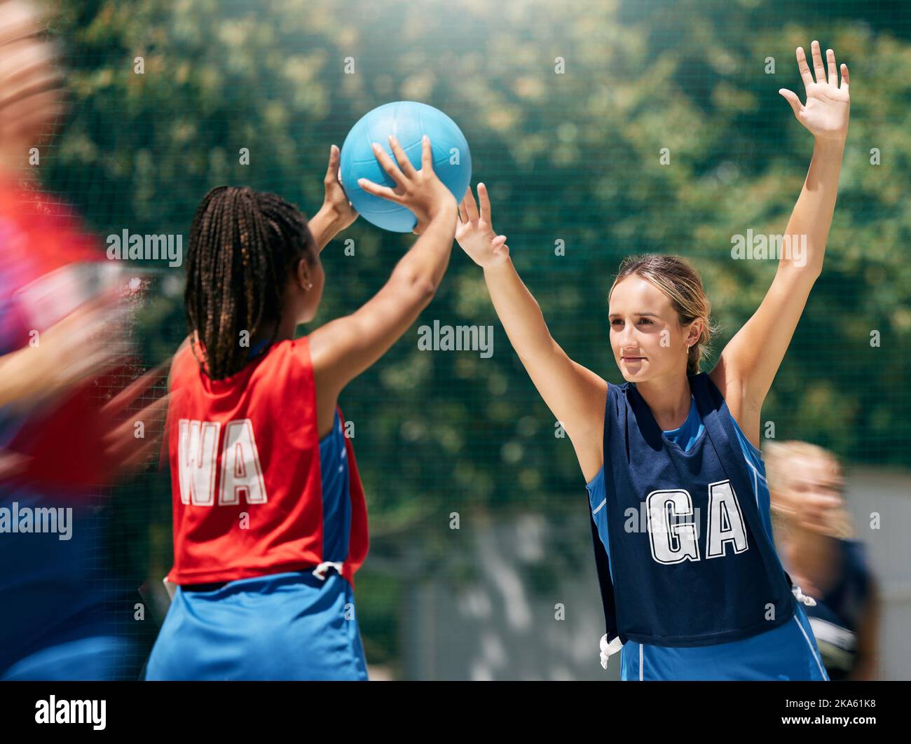 Sports, women and basketball competition at outdoor basketball court ...