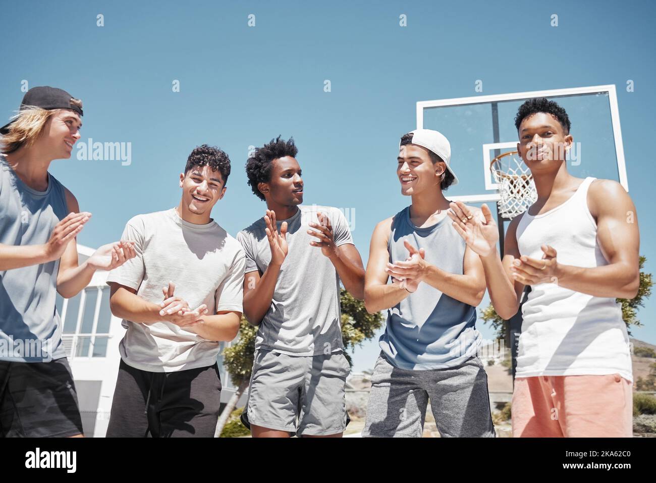 Friends, team and basketball men clapping hands in support of ...