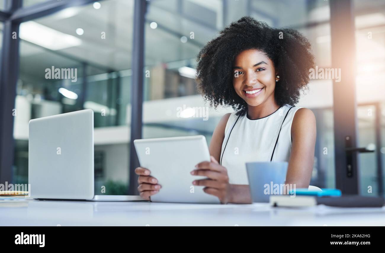 Technology and business go together in todays age. an attractive young ...