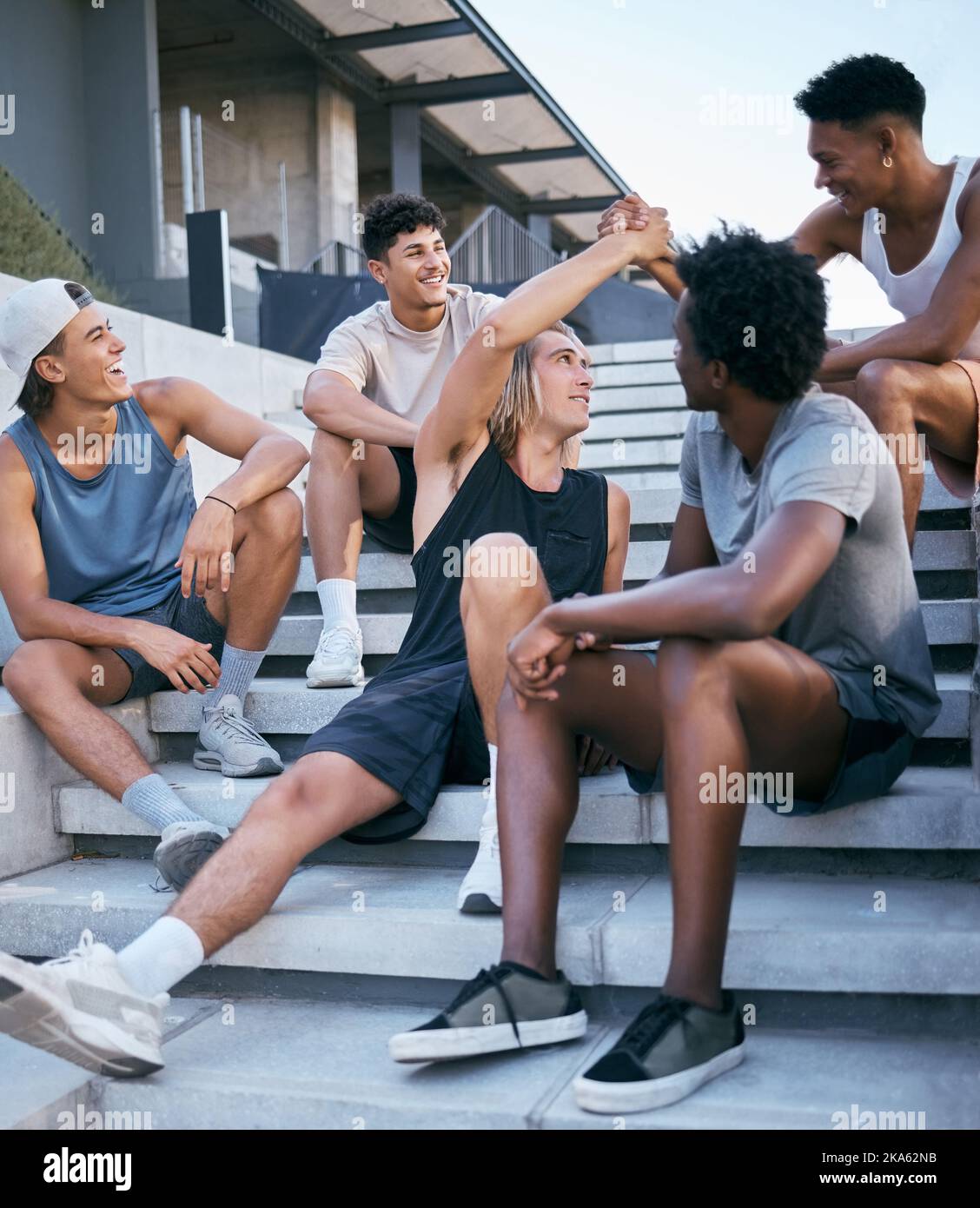 Friends, relax and group of men on building steps after training ...