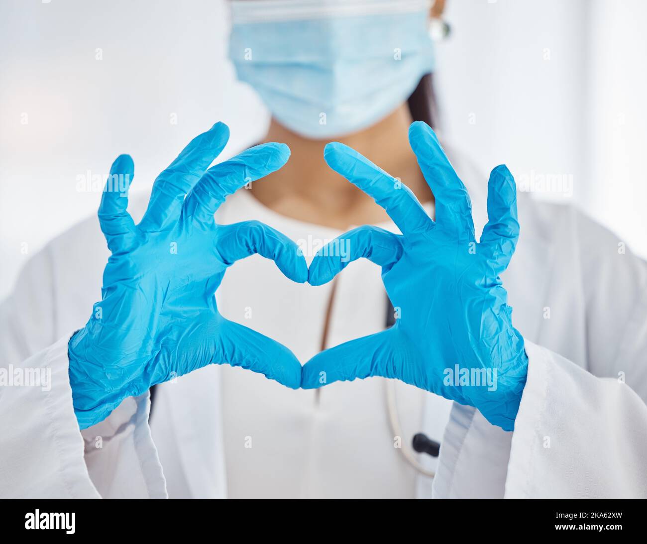 Doctor, hands and heart sign for covid healthcare, love or trust for ...
