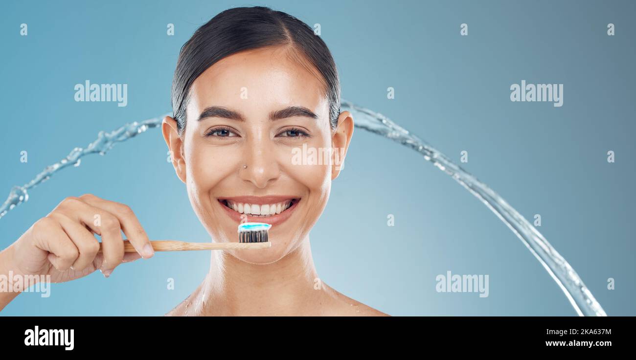 Woman brushing teeth, water splash and wellness, dental cleaning and ...