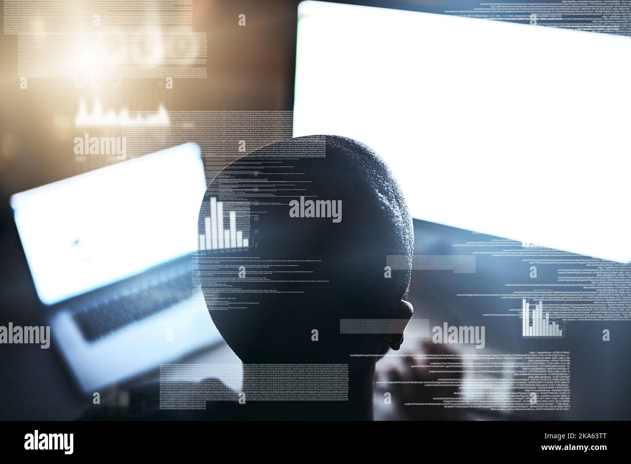 He knows the difference between a String and a Thread. Rearview shot of a young male hacker ...