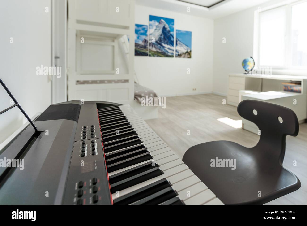 Modern synthesizer in the children's room Stock Photo - Alamy